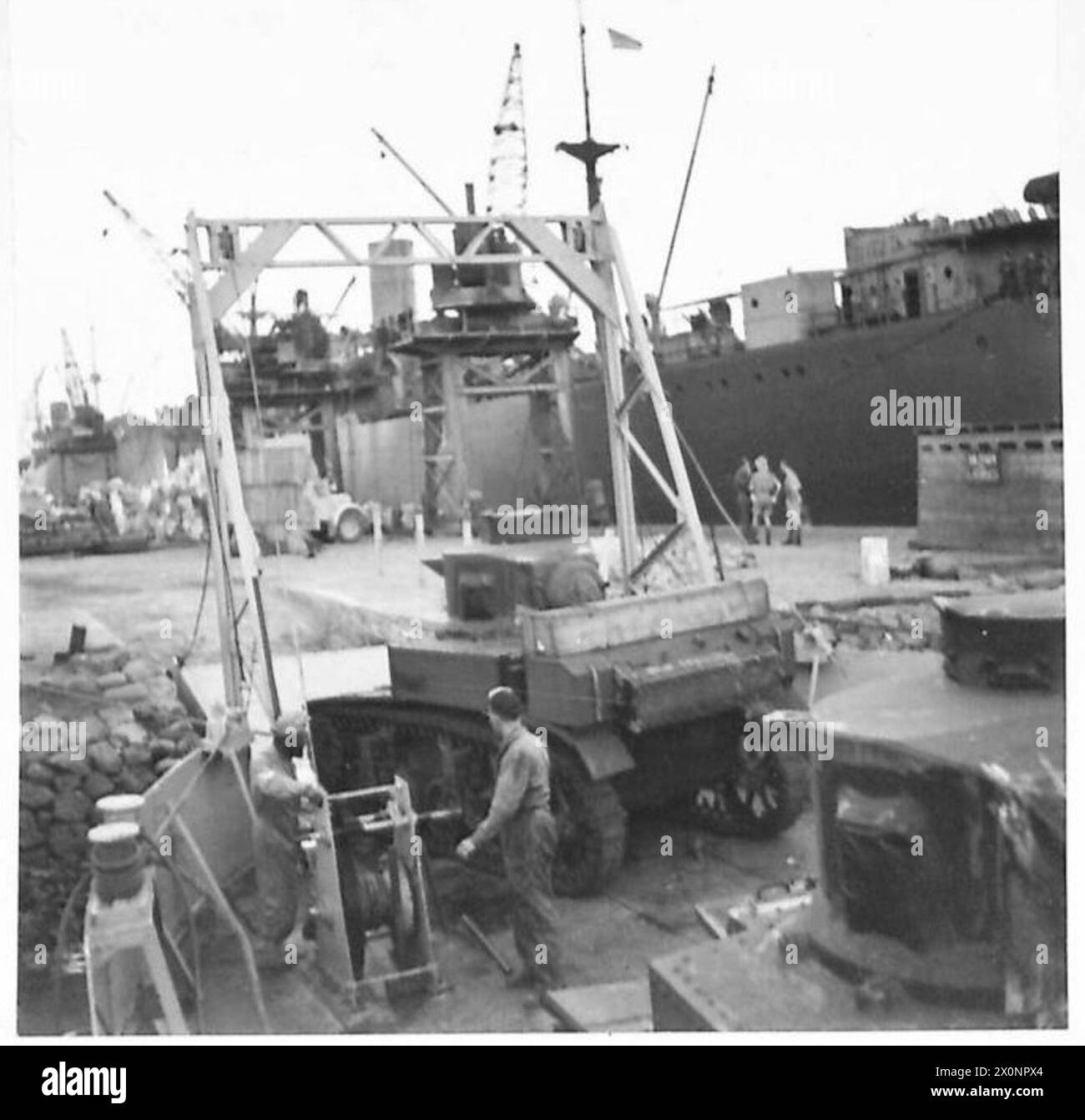 MORE AMERICAN TANKS ARRIVE IN THE MIDDLE EAST - At the dock the tamp of ...