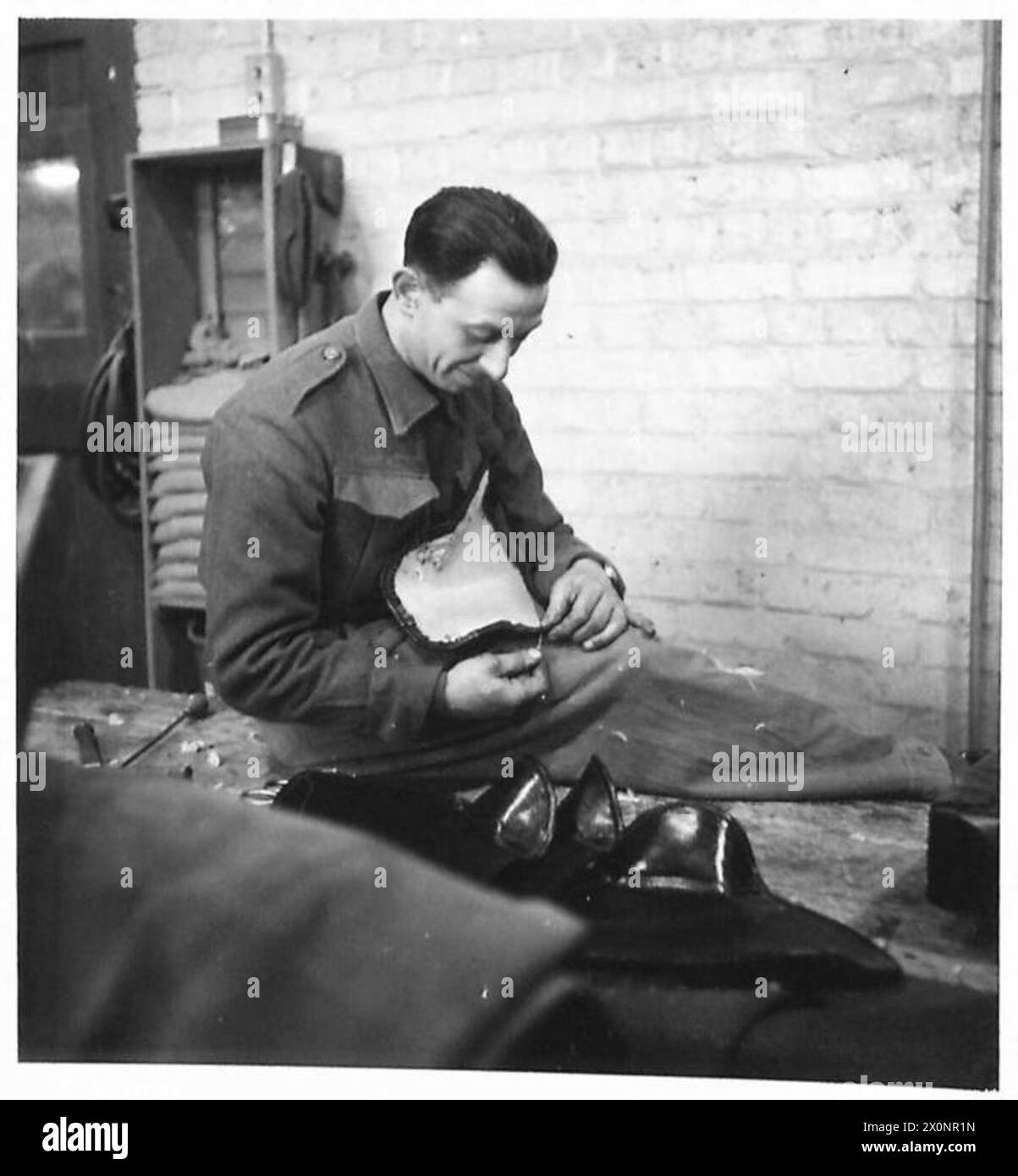 A photographic negative showing Craftsman Voplovitch of Tottenham ...
