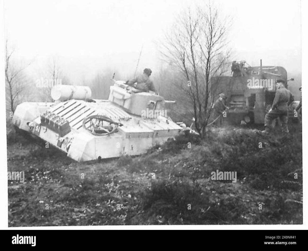A Valentine Mk. III tank of the 8th Armoured Division is being ...