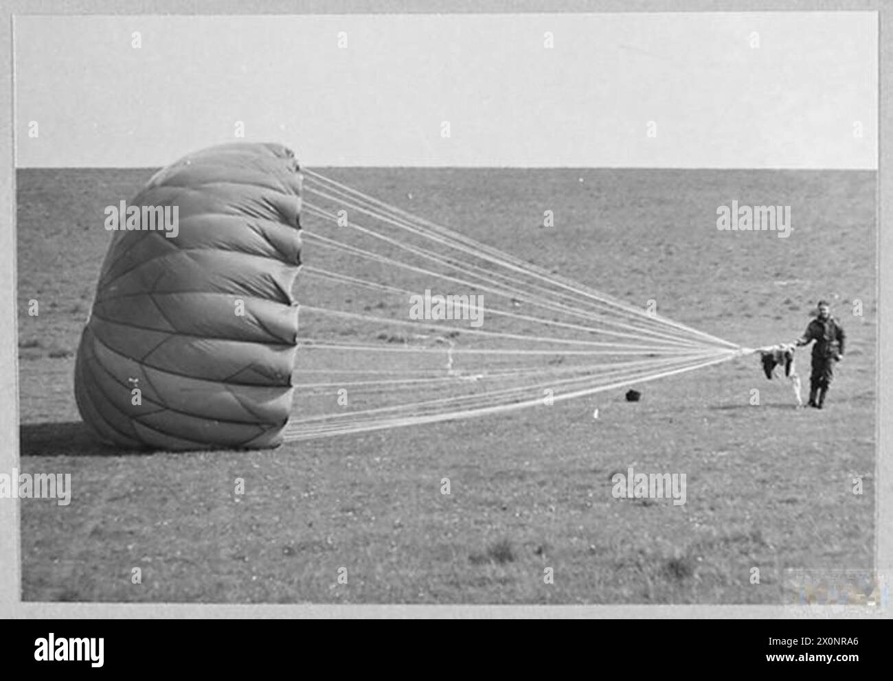 PARATROOPS DROPPED BY R.A.F. - Picture (issued 1944) shows - Here is a ...