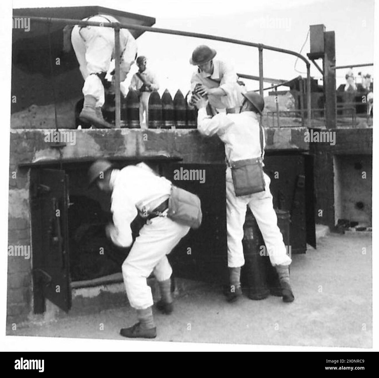 AT A COASTAL ARTILLERY SCHOOL - Ammunition numbers of a six inch ...
