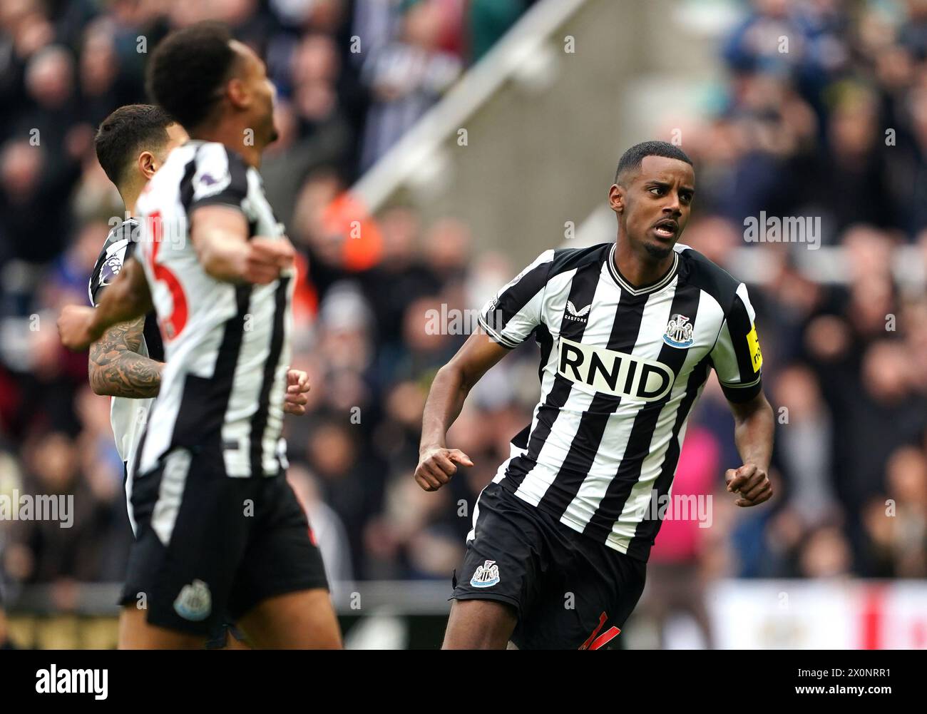 Newcastle United's Alexander Isak (right) celebrates scoring their side ...
