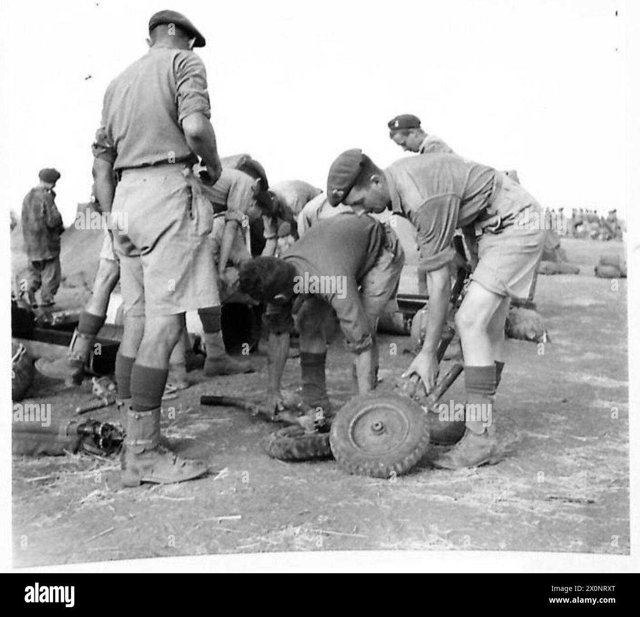 PREPARING FOR A PARATROOP EXERCISE - Packing a small trolley into a ...
