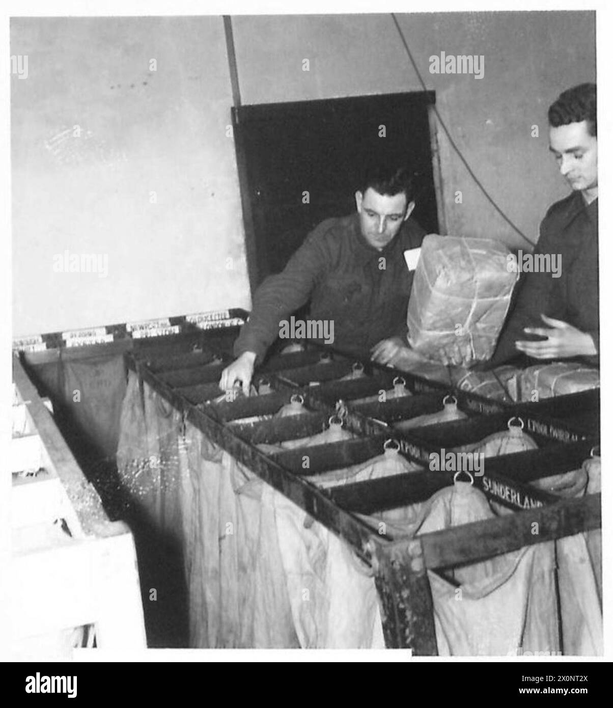 THE WORK OF THE ARMY POST OFFICE - Parcels being sorted. Photographic ...