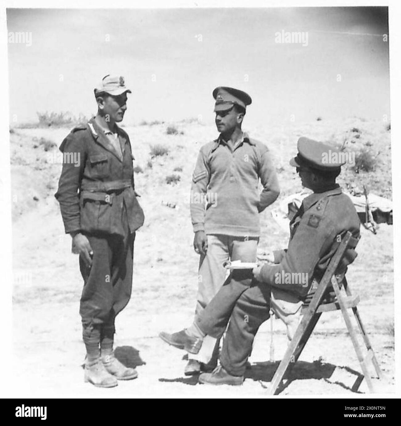 WITH A HIGHLAND DIVISION IN THE MARETH LINE - An Italian prisoner being ...