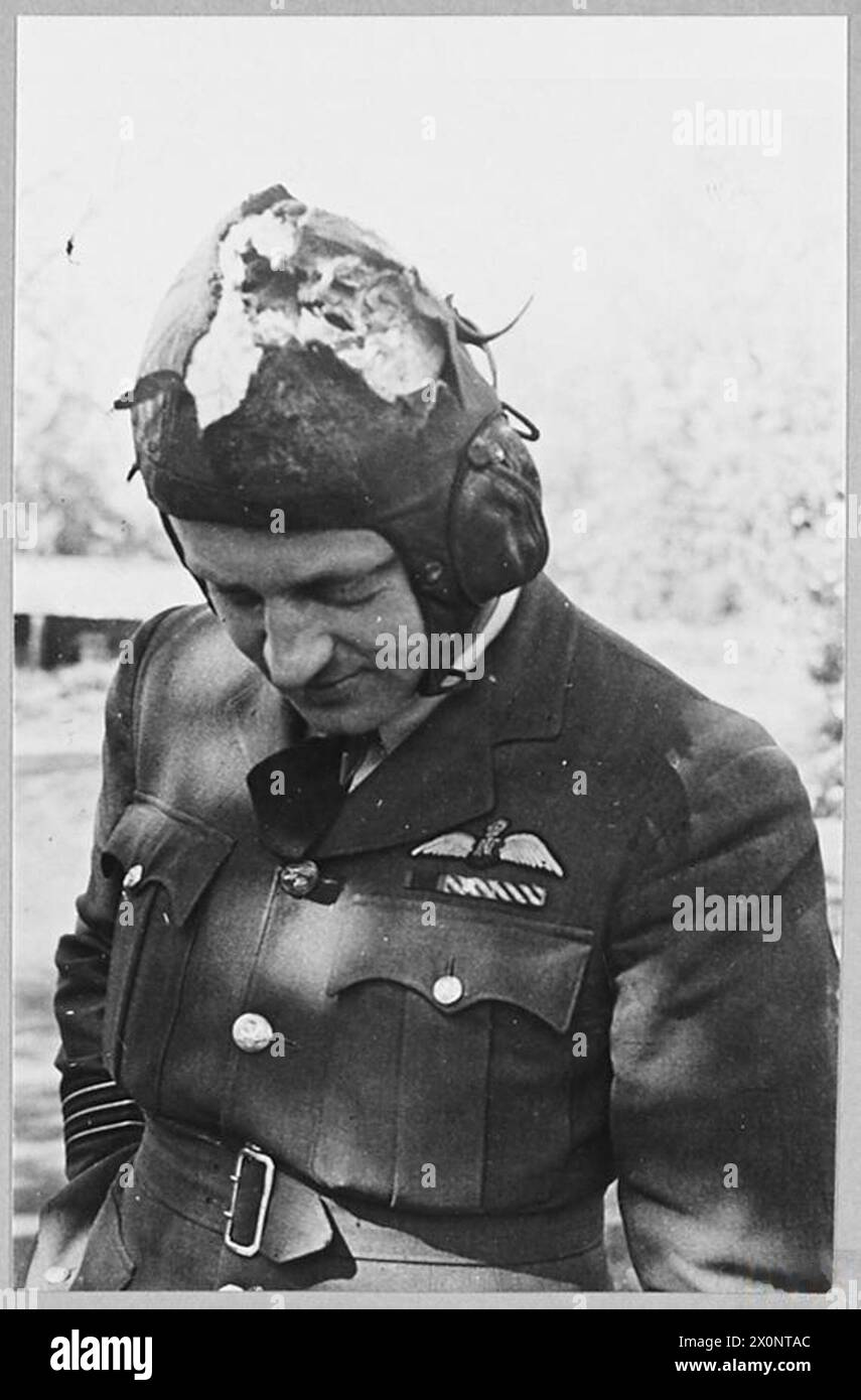 Wing Commander Arthur Hay Donaldson, DSO, DFC, AFC, is shown wearing a ...