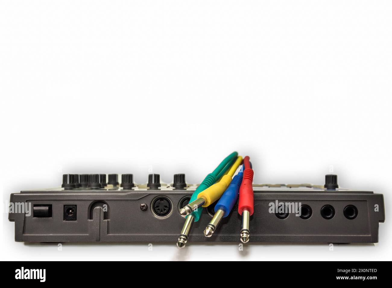 Audio jacks and music device rear panel with connectors on a white ...