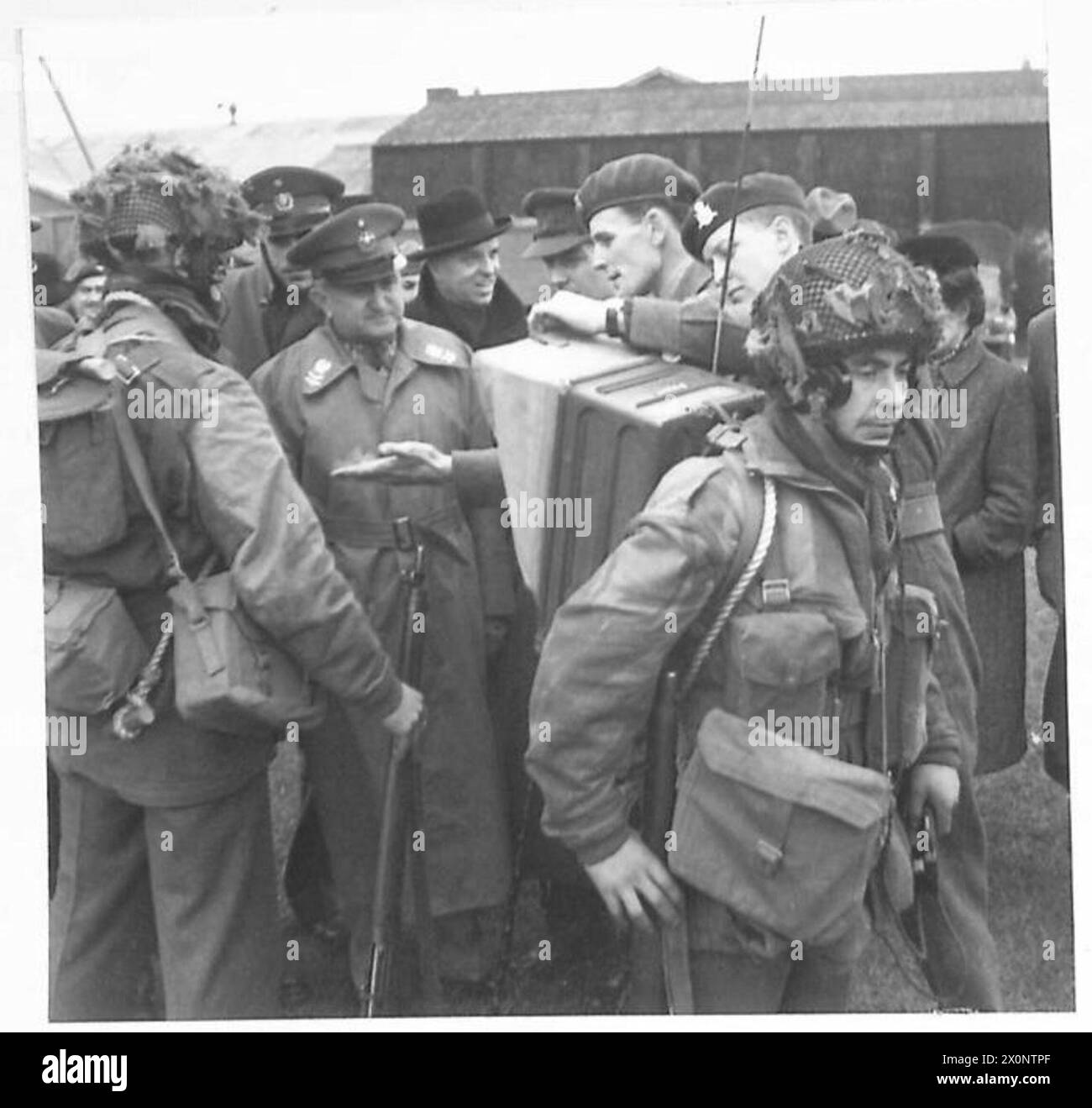 Photograph showing Brazilian War Minister General Dutra inspecting a ...