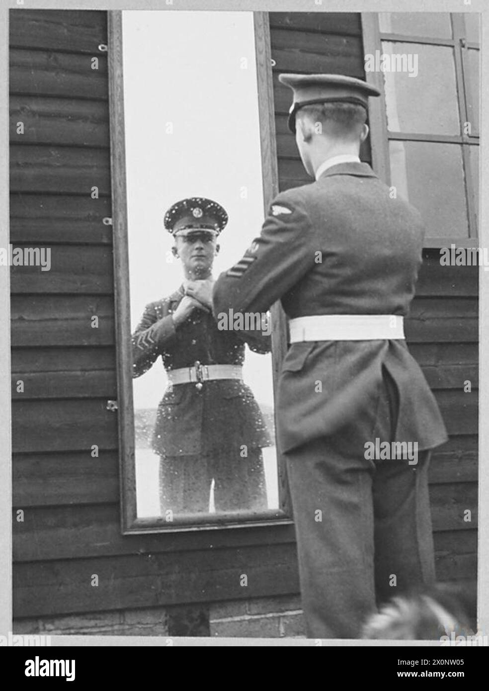 AT R.A.F. APPRENTICE SCHOOL, HALTON - An apprentice gives himself a ...