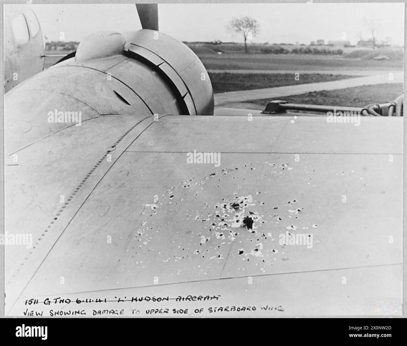 DAMAGE TO "HUDSON AIRCRAFT" BY "FLAK" - Photographs show damage to ...