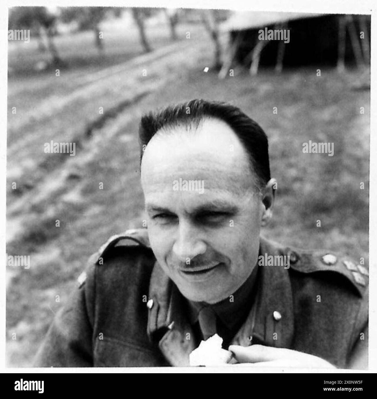 Brigadier J. Lister attends an Eighth Army conference at Tactical ...