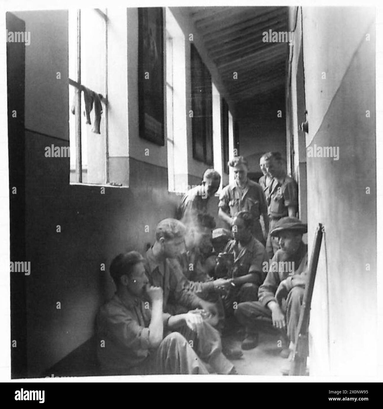 Soldiers of the D.C.L.I rest and eat in a passage of Incontro Monastery ...