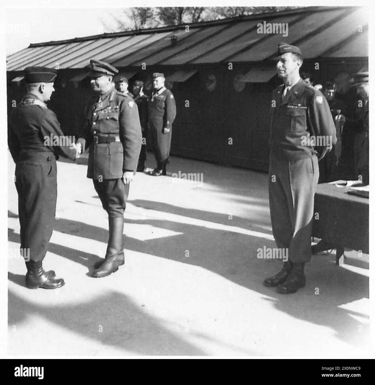 Field Marshal Alexander shakes hands with Brigadier General Frank O ...
