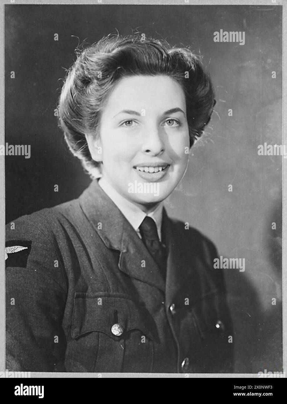 Aircraftwoman Priscilla 'Paddy' Barnes of the WAAF monitors aircraft in ...