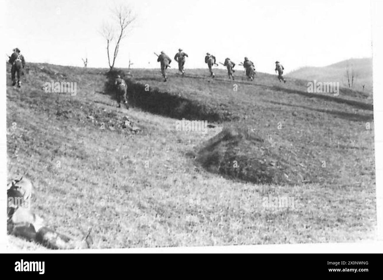 78 DIVISION TRAINING SCHOOL - A section of Infantry in various stages ...