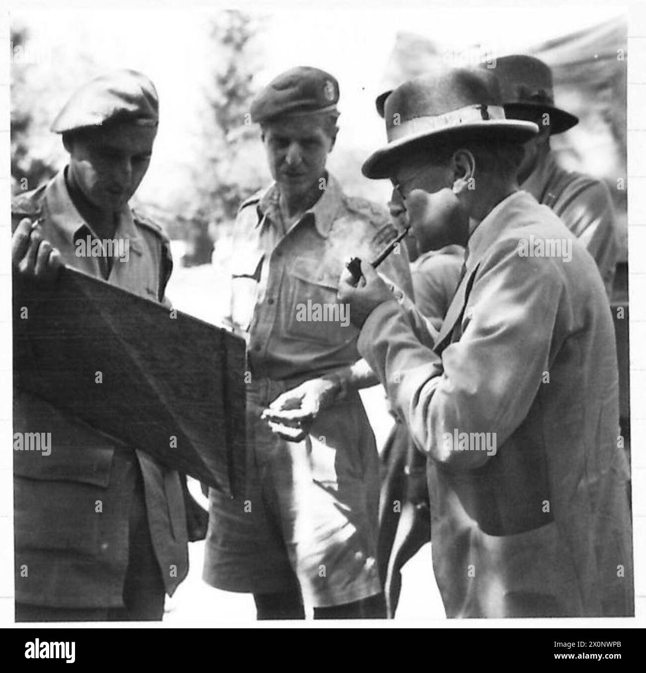 DEPUTY PRIME MINISTER VISITS 8TH ARMY FRONT - Mr. Attlee chatting with Colonel Lord Tweedsmuir ...