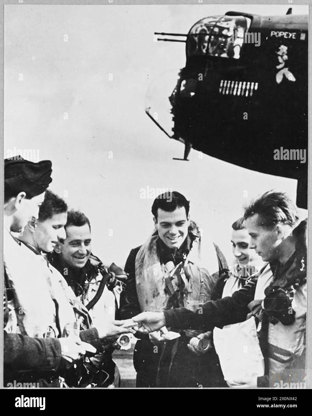 CHOCOLATE RATIONS FOR BOMBER CREWS - The captain of a heavy bomber ...