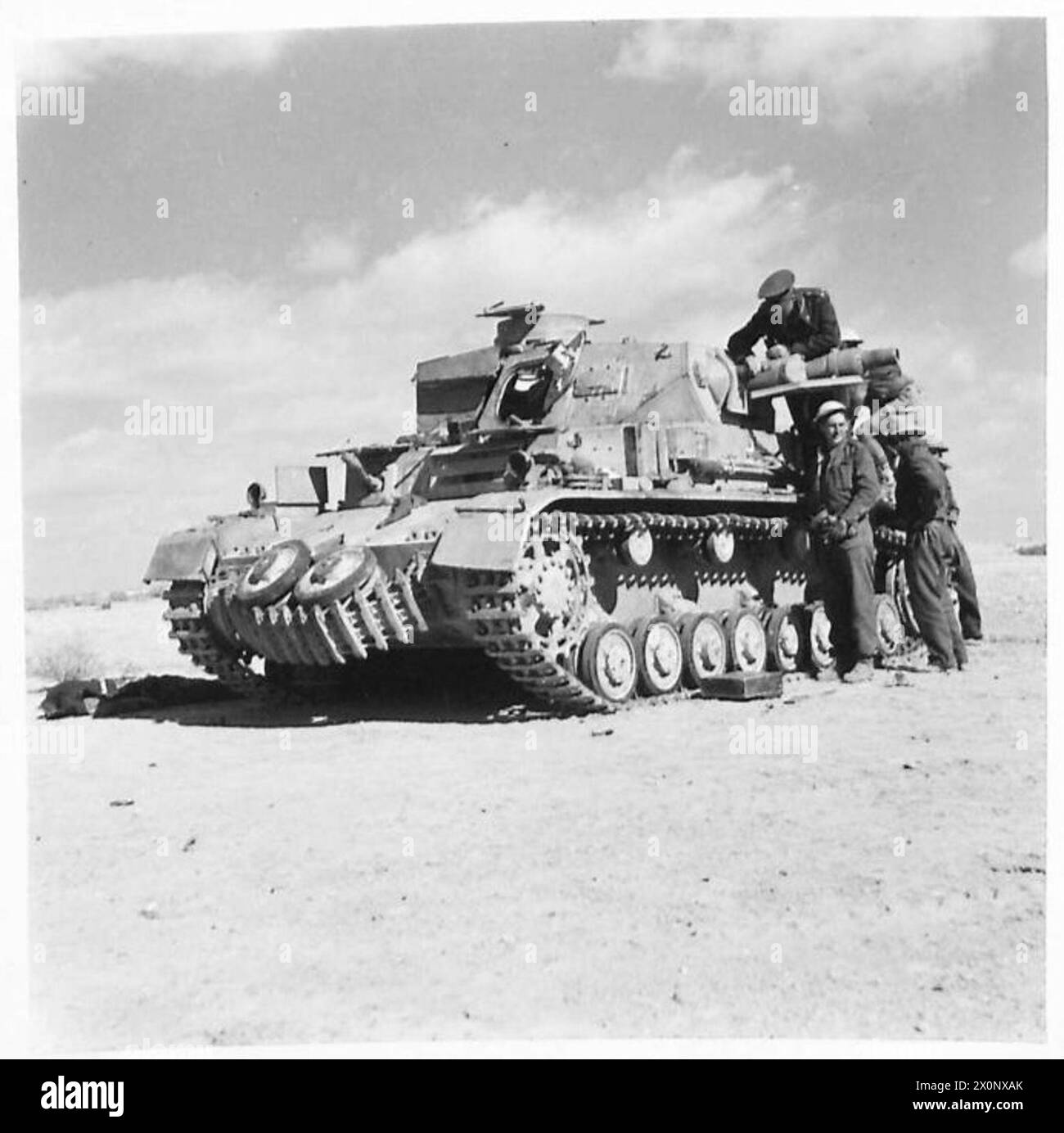 Photograph showing a captured German tank in the Western Desert, with ...