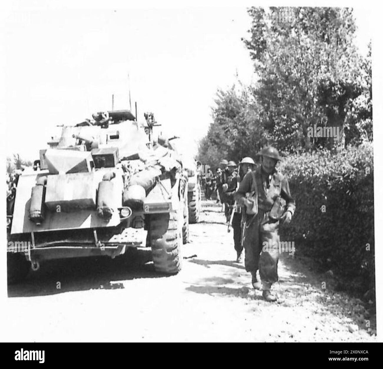 Infantry and tanks advance towards and begin crossing the River Po ...