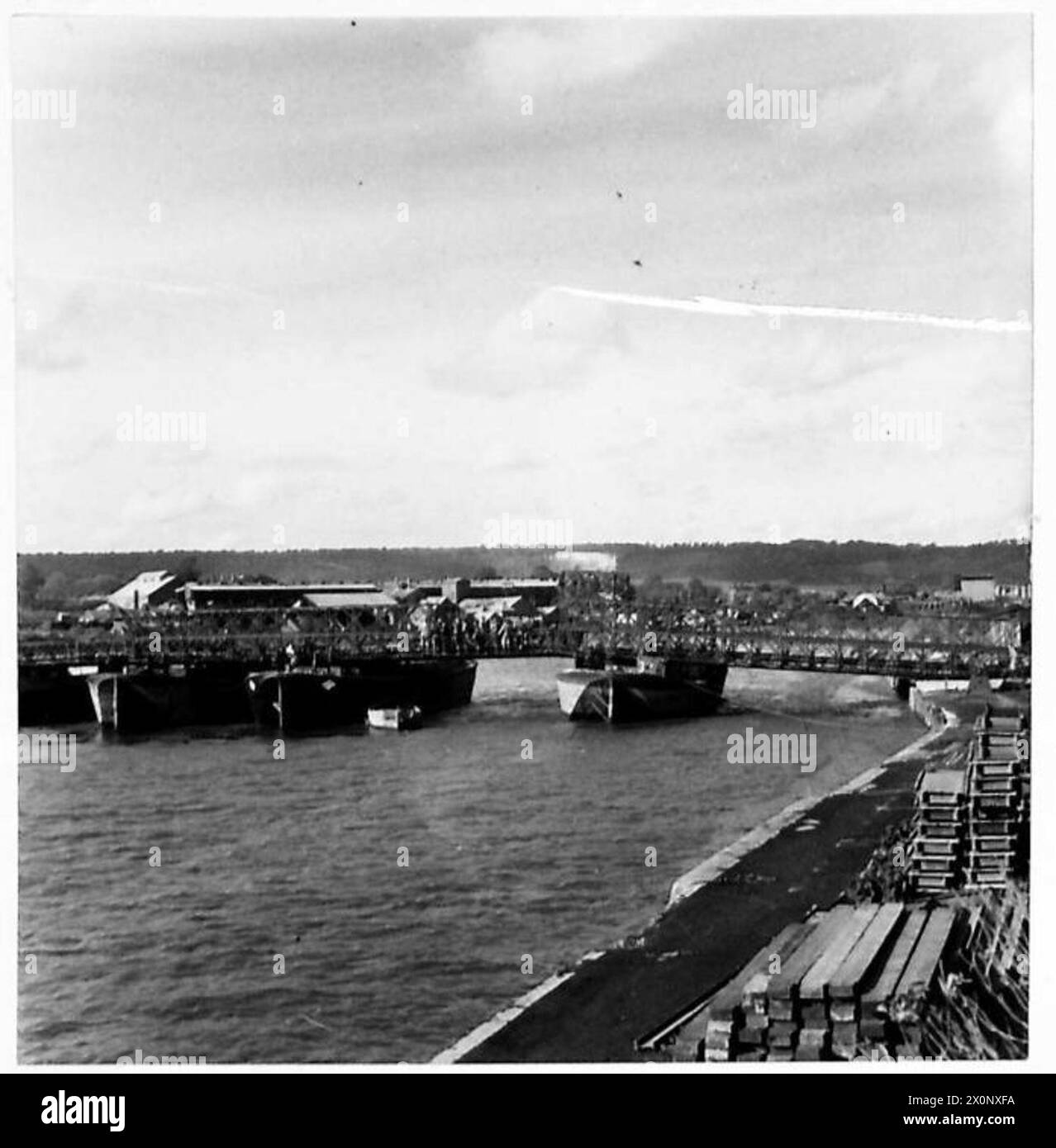 A Churchill tank crosses a Bailey Bridge to test its stability during ...