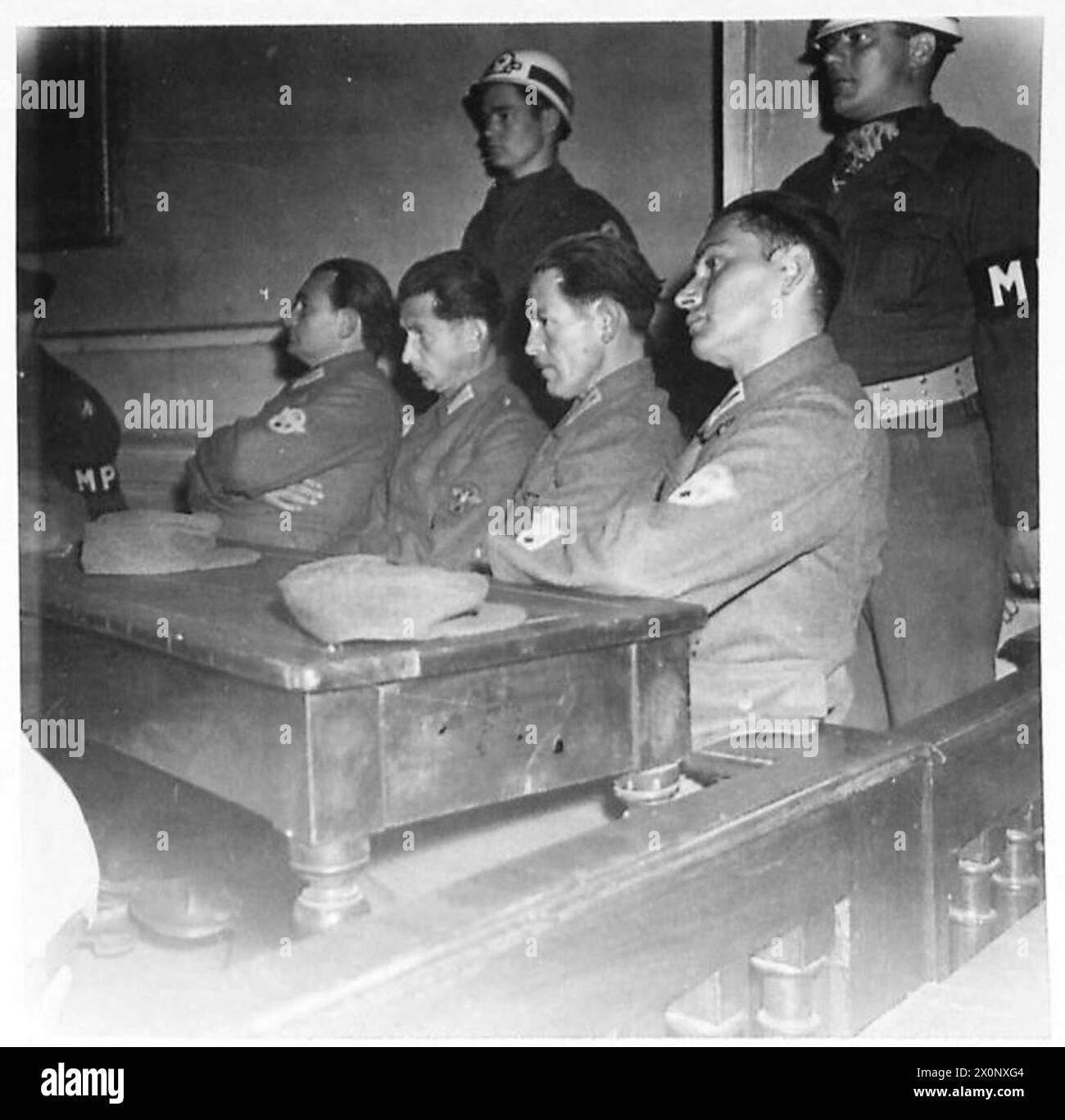 WAR CRIMINALS TRIAL - Closer view of the accused in dock:- Left to ...