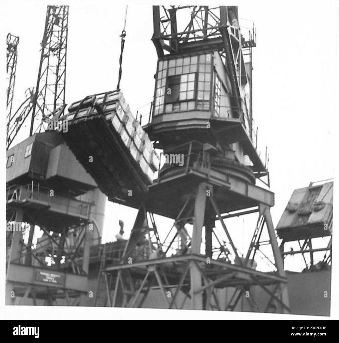 LOADING COMPO PACKS INTO SHIPS - Compo packs being loaded into a ship ...