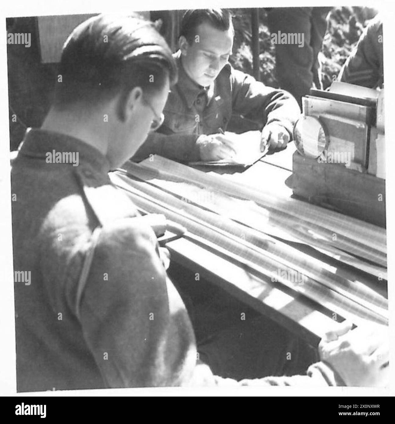 Gunner Simpson reads a film with 10-metre markings and six microphone ...
