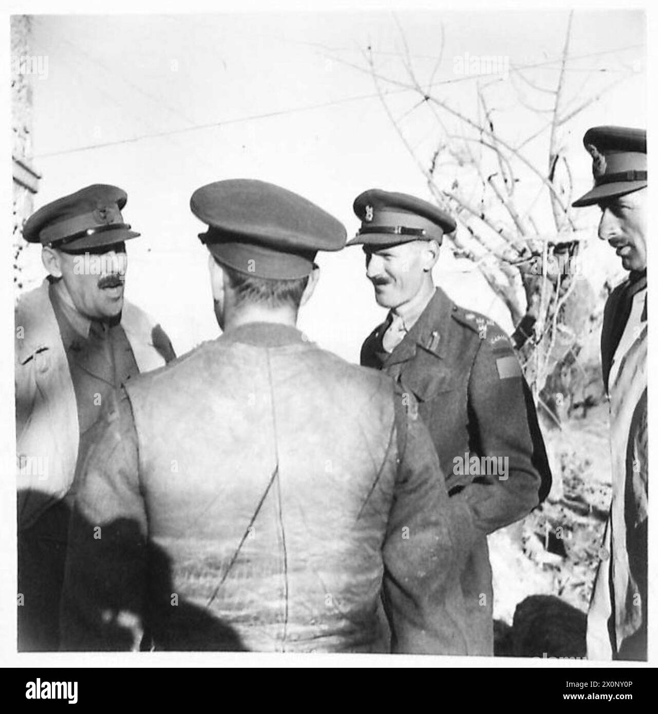 General Sir Oliver Leese speaks with Major E.D. Danby of the Carleton ...