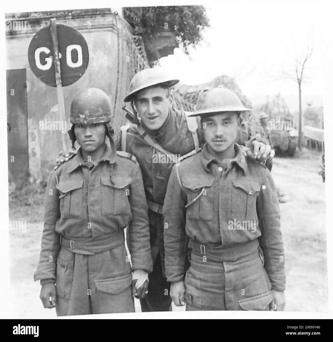 Lance Corporal William Trice of the CMP directs traffic in Frisna with ...