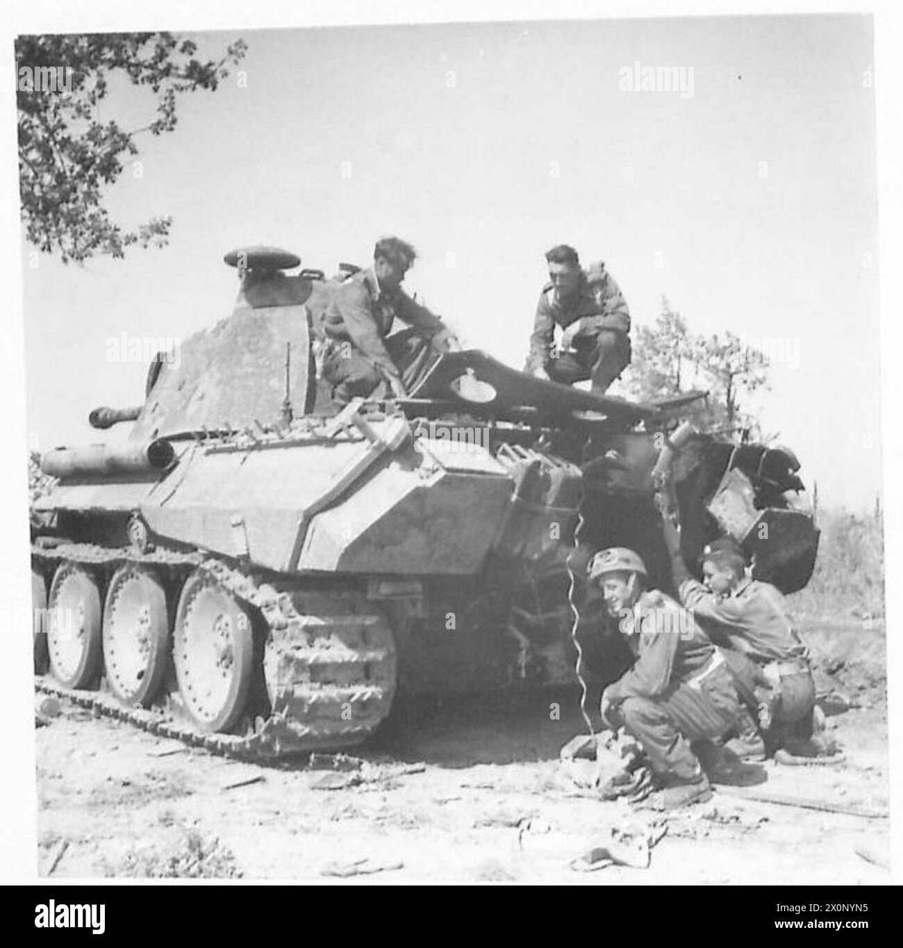 A German Mark V Panther tank is knocked out during the Eighth Army's ...