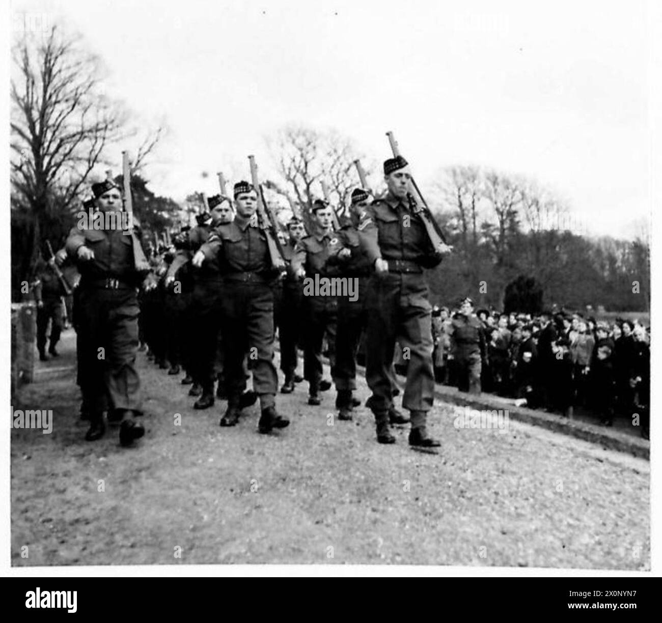 Photograph shows a battalion performing a drill display during Sussex ...