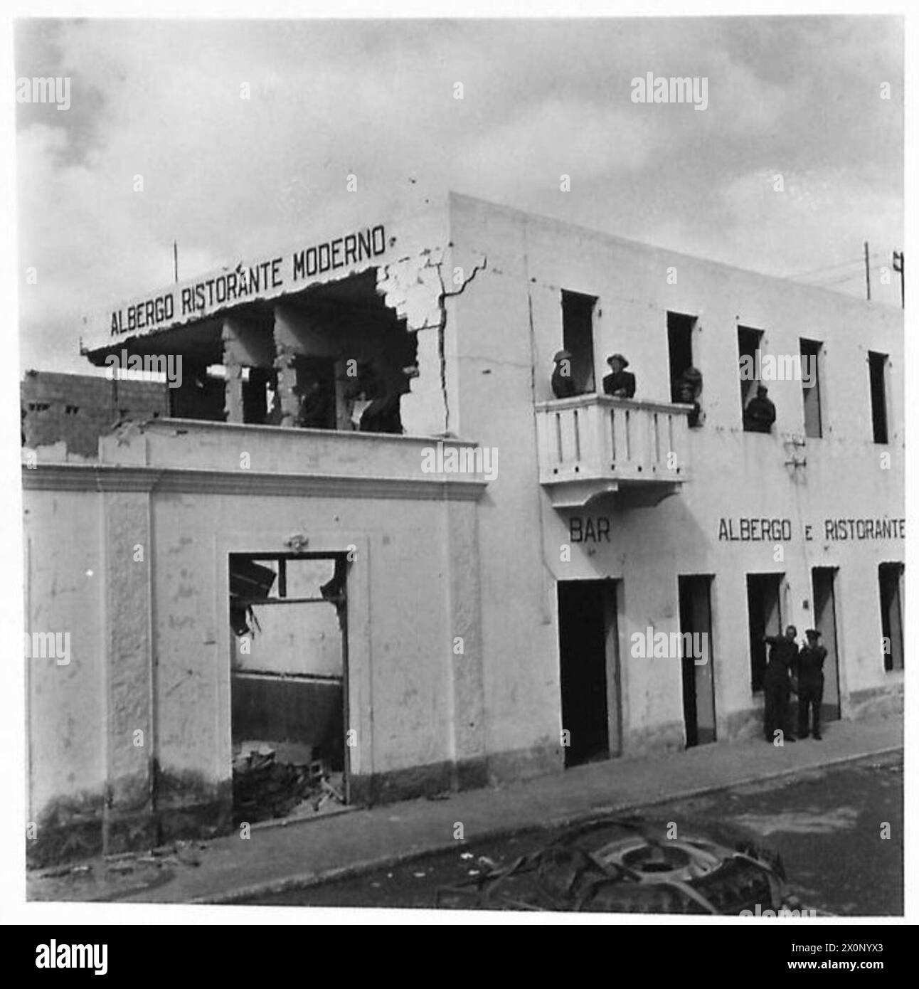 A bomb-scarred building in Tobruk, formerly a restaurant, now houses ...