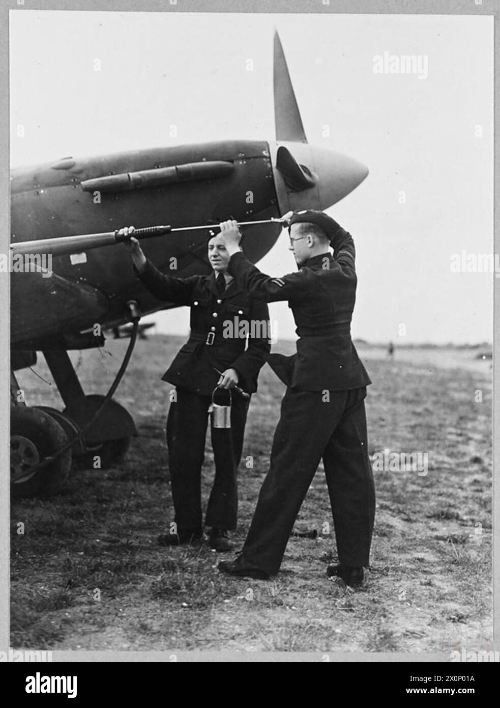In 1942, an Air Training Corps corporal cleaned a Spitfire cannon under ...