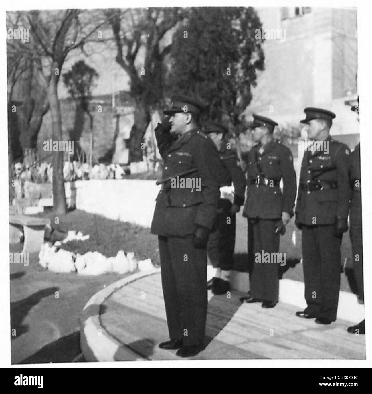 Colonel H.P.P. Robertson takes the salute at the passing out parade of ...