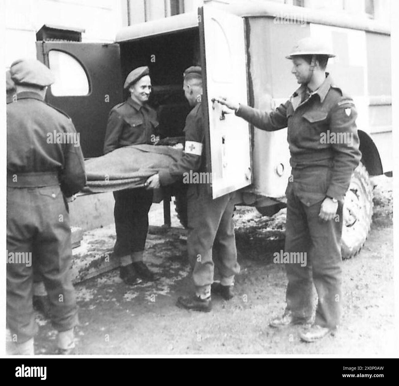 Gibson Hazard, of the American Field Service, delivers a casualty to ...