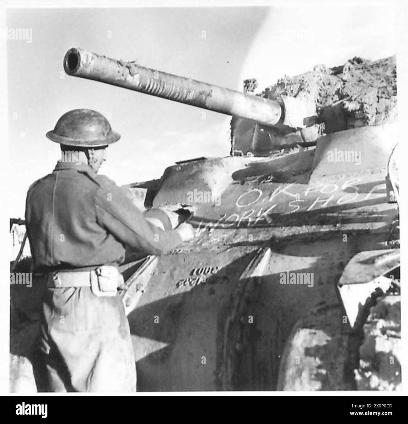Trooper Tollerton of Ealing, London marks a tank as 'O.K. for Workshops ...
