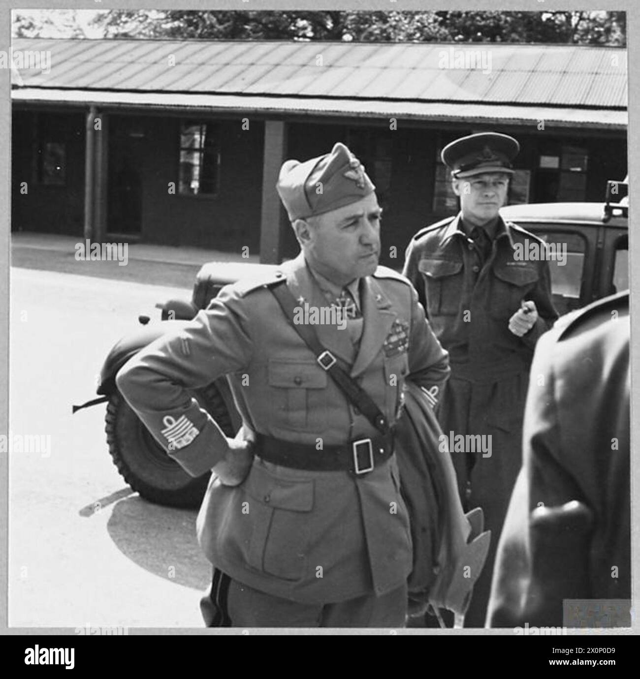 Italian Commander-in-Chief arrives at a British POW camp, accompanied ...