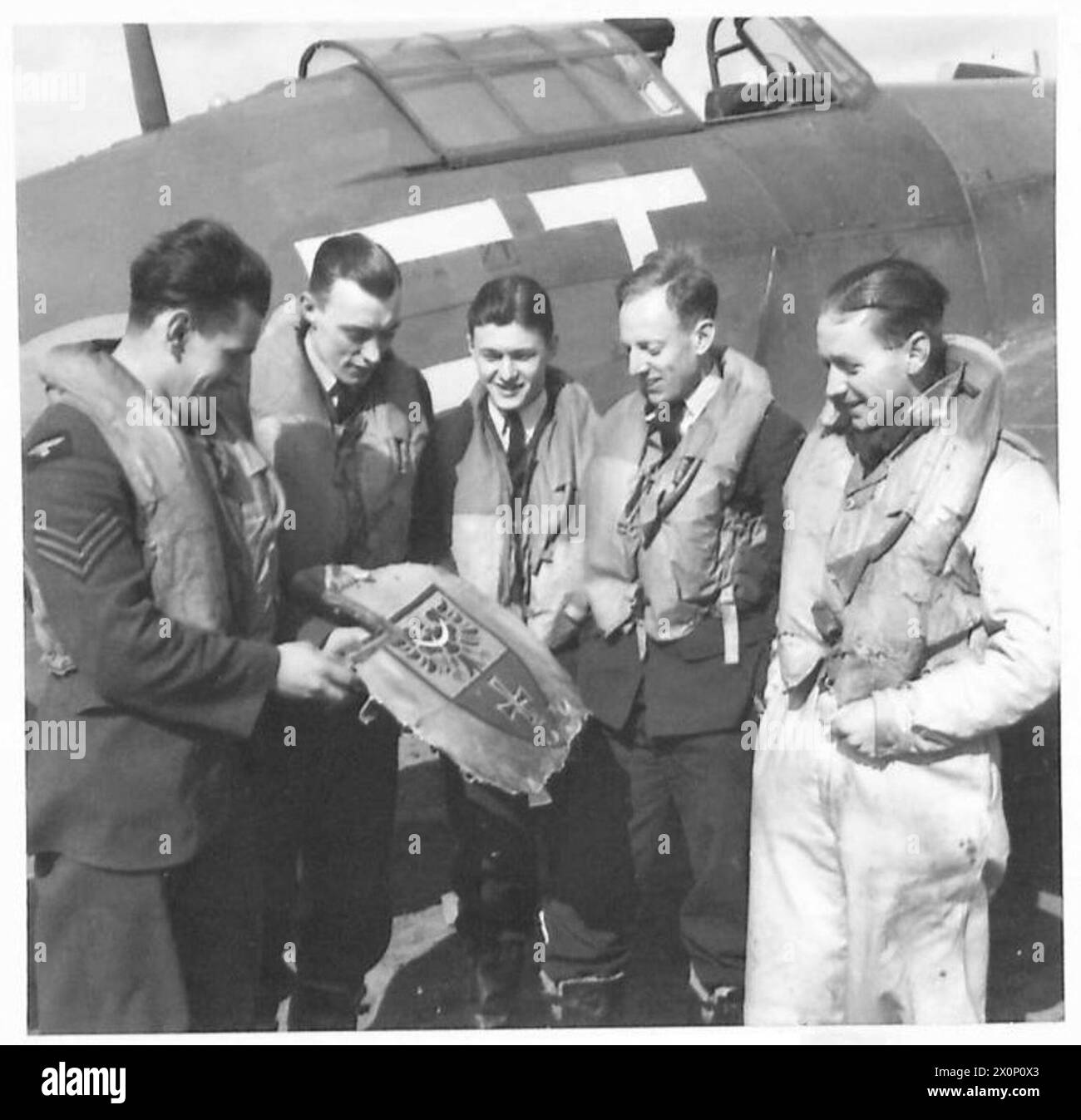 WITH THE R.A.F. IN SCOTLAND - The squadron badge of a German J.U.88 ...