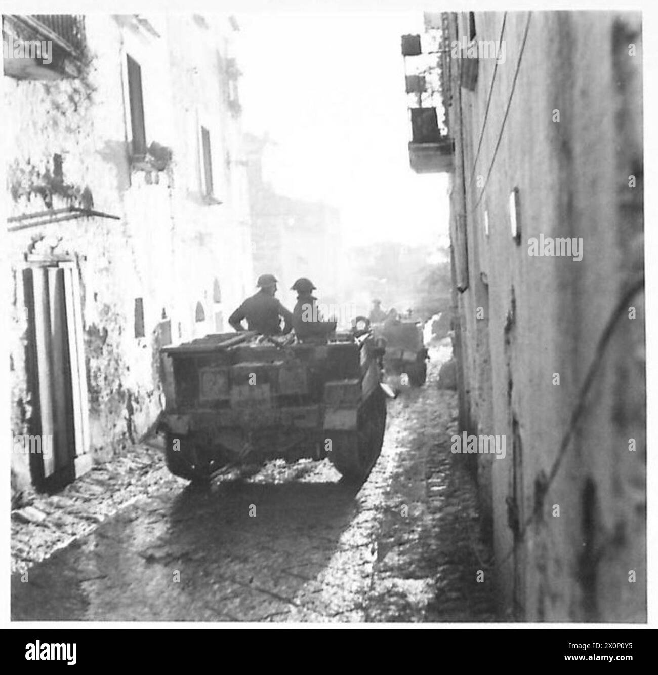 FIFTH ARMY - BRITISH SECTION - Loaded Bren carriers leaving ...