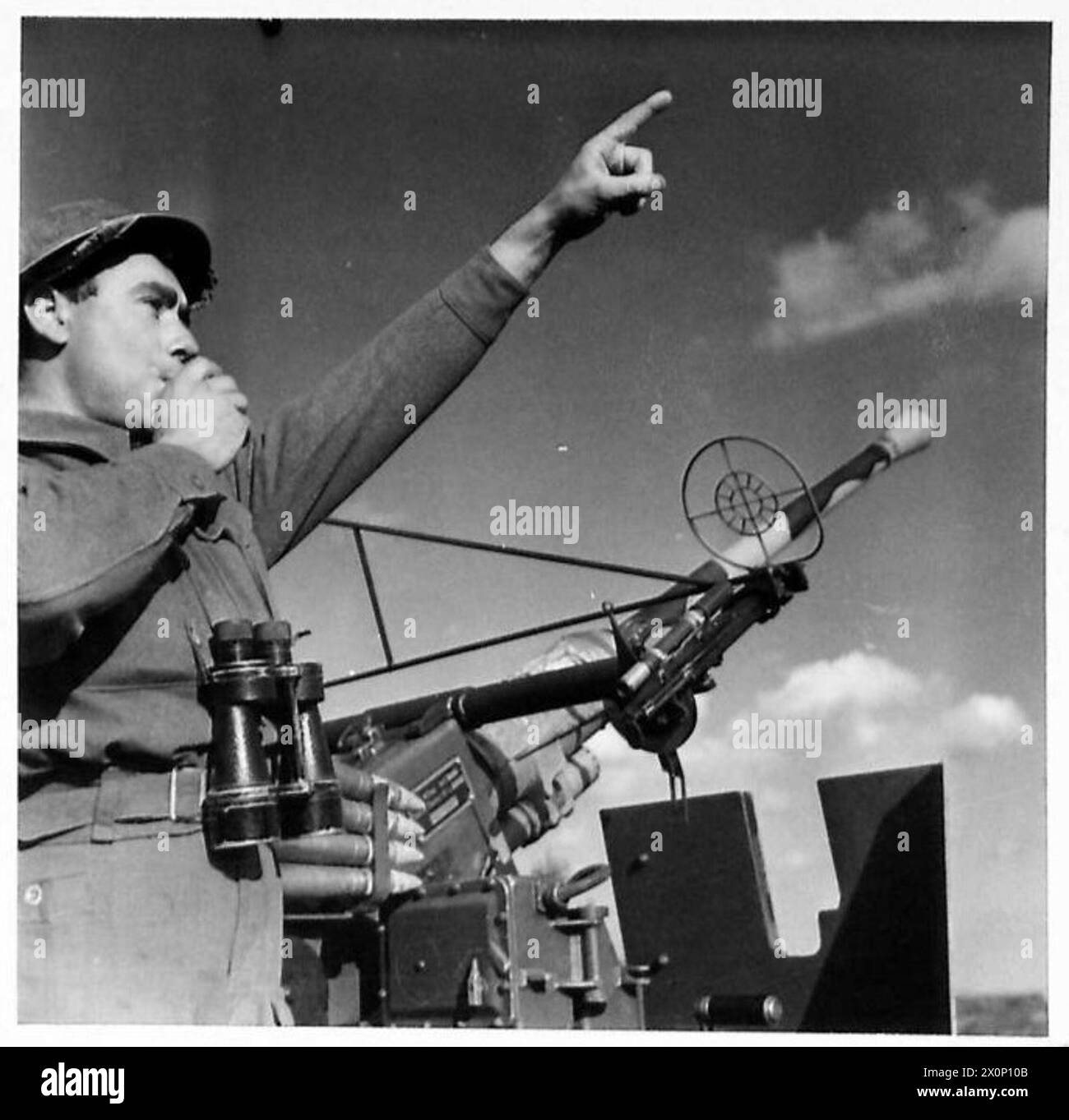 ITALY : EIGHTH ARMYMOBILE ARTILLERY - The air sentry blows a whistle ...