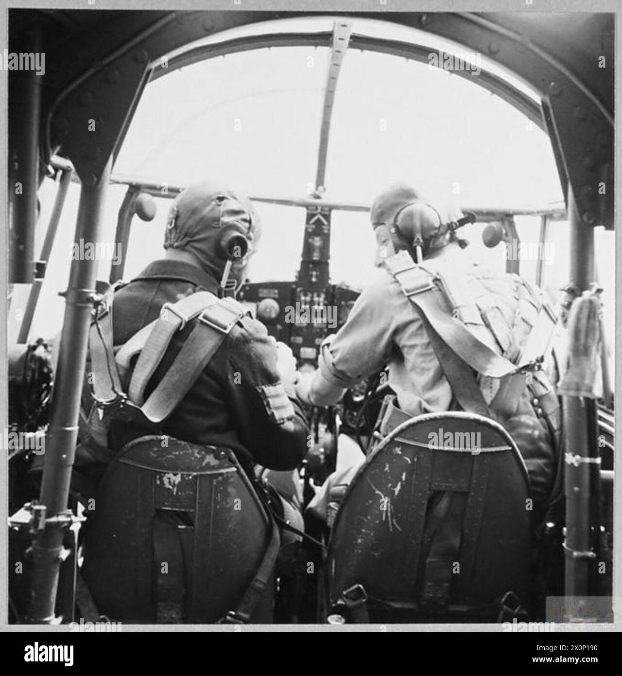 In 1942, RAF bomber pilots in training receive instruction on twin ...