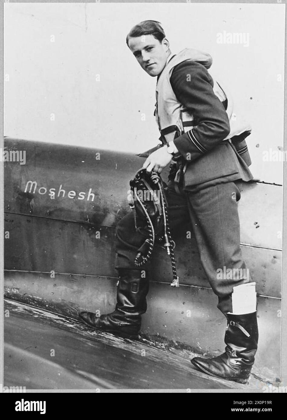 A Basutoland Squadron pilot climbs into a Spitfire named 'Moshesh ...