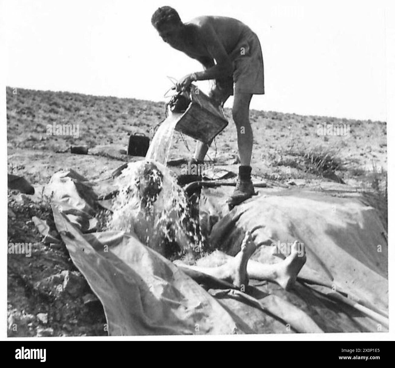 Soldiers of the Eighth Army use a Mareth Shower Bath to maintain ...