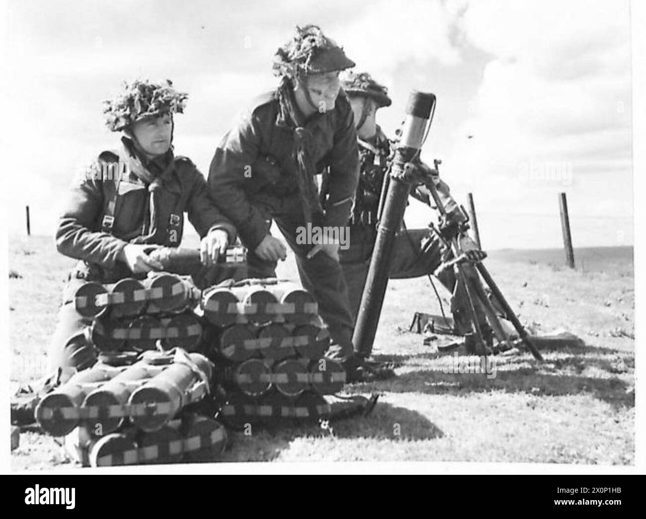 MUNITION WORKERS WATCH ARMY DEMONSTRATE 3-INCH MORTAR - The mortar crew ...