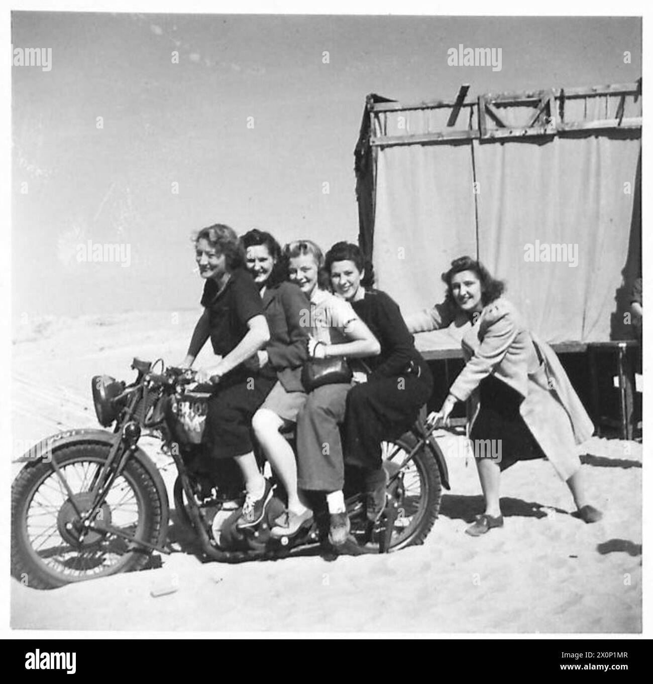 Photograph shows members of the E.N.S.A. performing during a concert ...