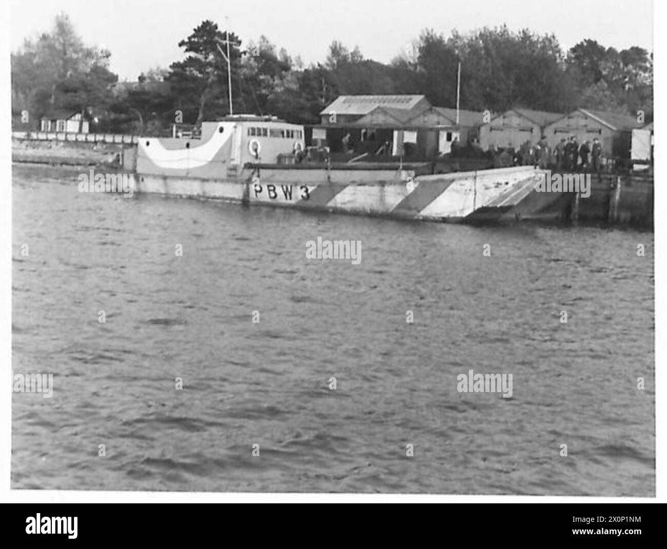 Photographs show the TN.5 special assignment involving a workshop barge ...