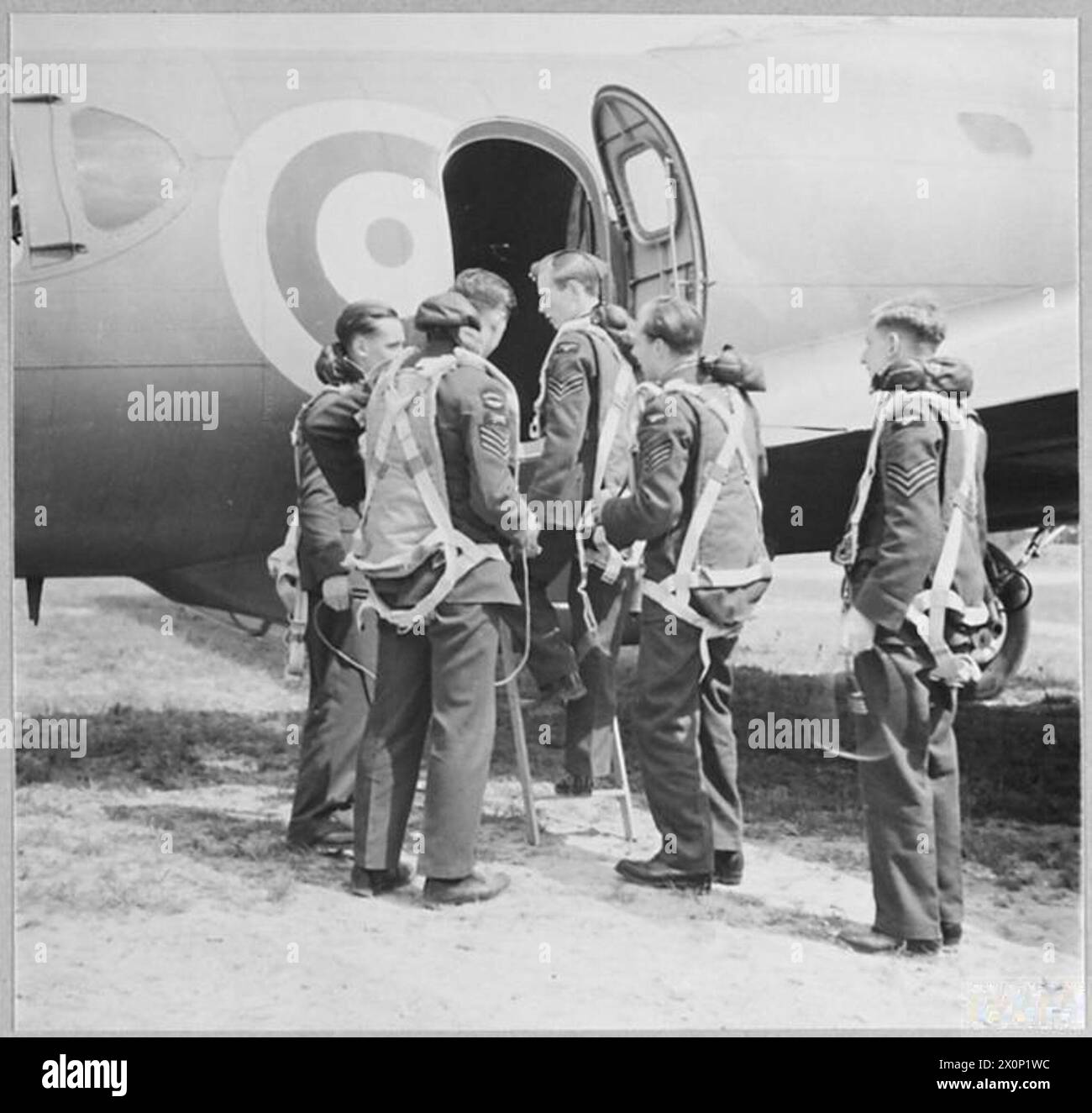STILL THEY COME - R.A.F. crew going aboard the Boeing "Flying Fortress ...