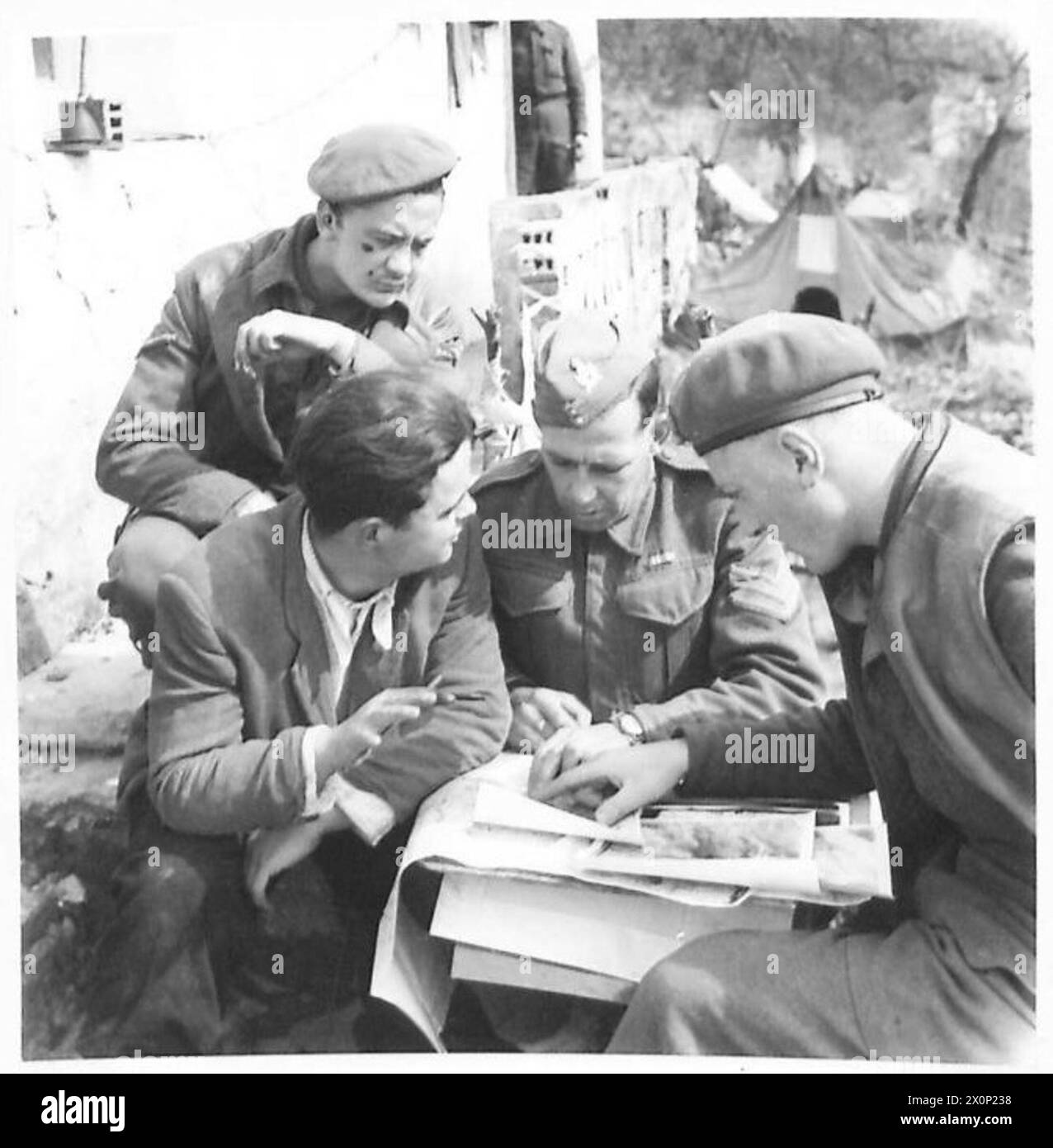 The photograph shows Captain Nicholson, Sergeant Adams, and Lance ...