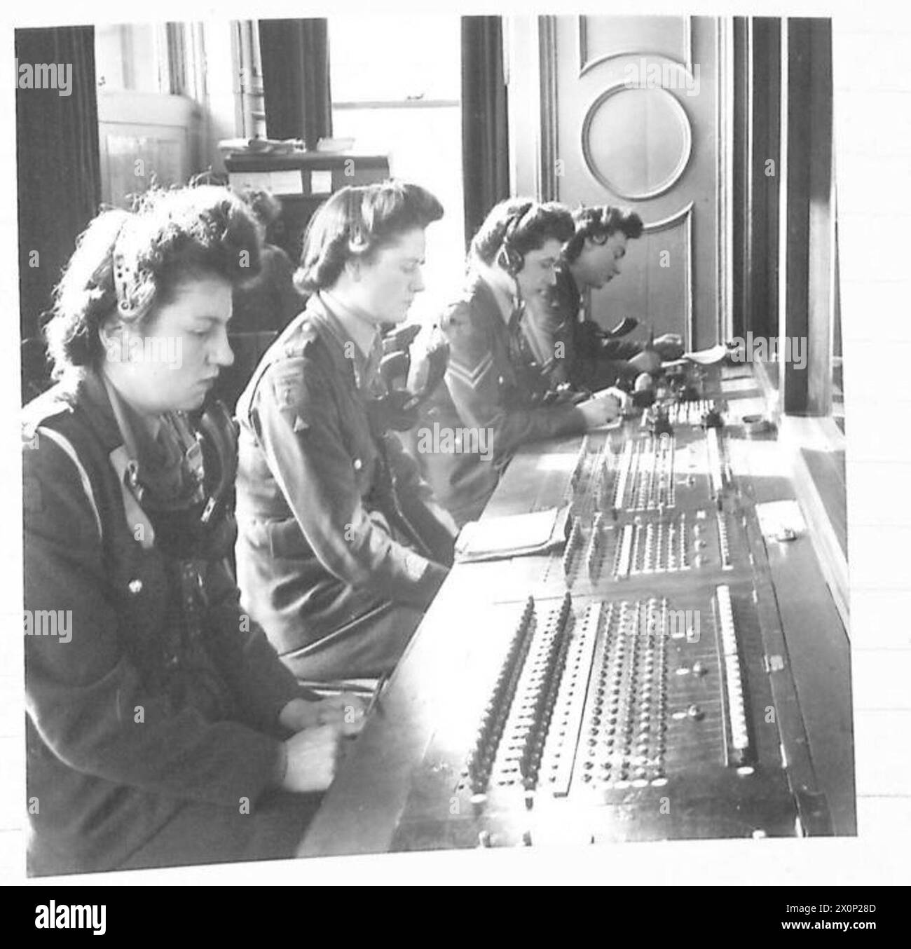A.T.S. plotters and switchboard personnel are photographed at No.405 ...