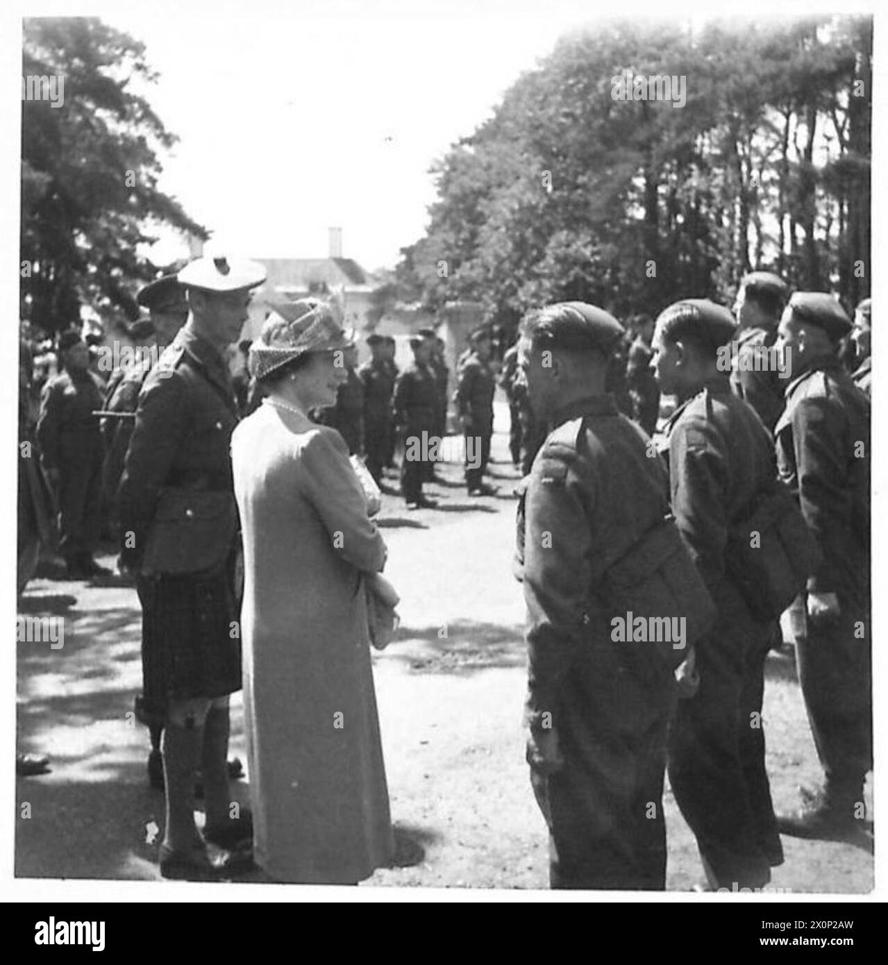 KING AND QUEEN VISIT TROOPS - The King and Queen talking to Driver ...